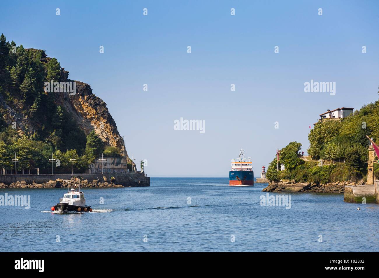 Spain, Guipuzkoa, Bask country, Pasaia, a commercial liner returns to ...