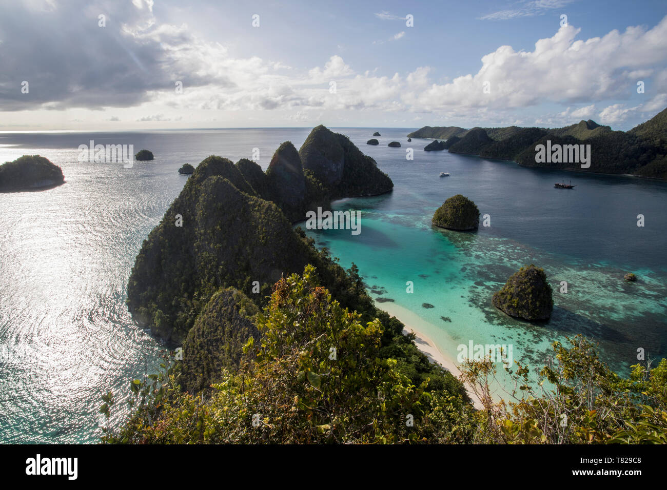 Aerial view of lagoon and karst limestone formations in Wayag Island ...