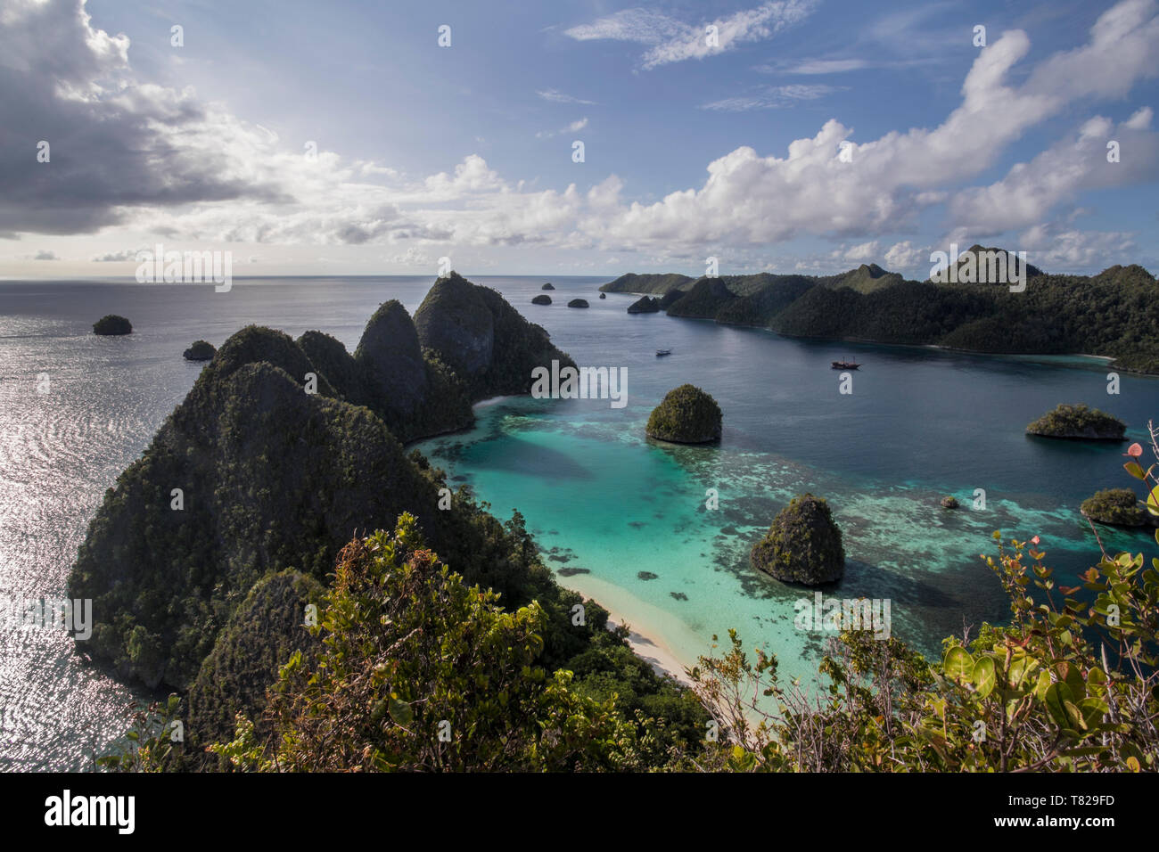 Aerial view of lagoon and karst limestone formations in Wayag Island ...