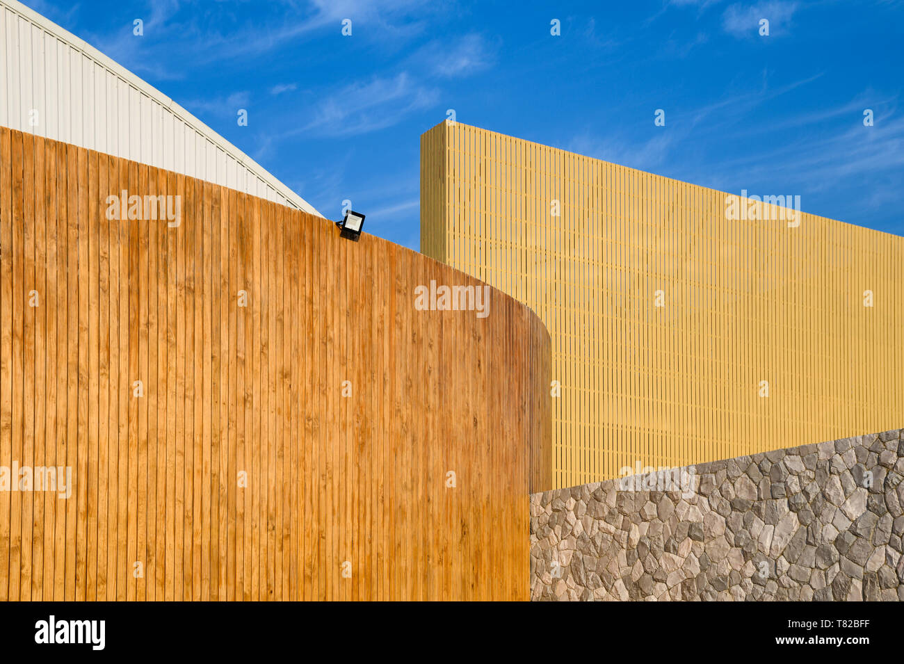 Exterior layer design of wooden building with blue sky Stock Photo - Alamy