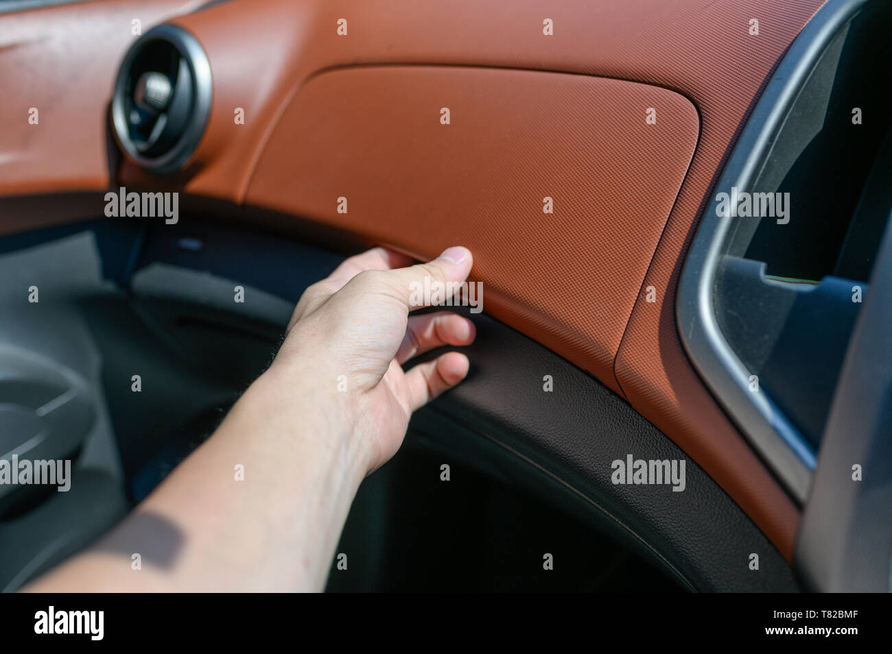 Hand opening of compartment box in dashboard car Stock Photo - Alamy