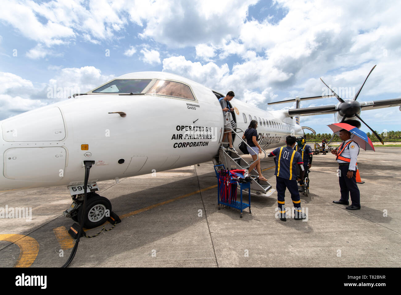 Apr 26, 2019 Passengers getting off the plane at Siargao airport ...
