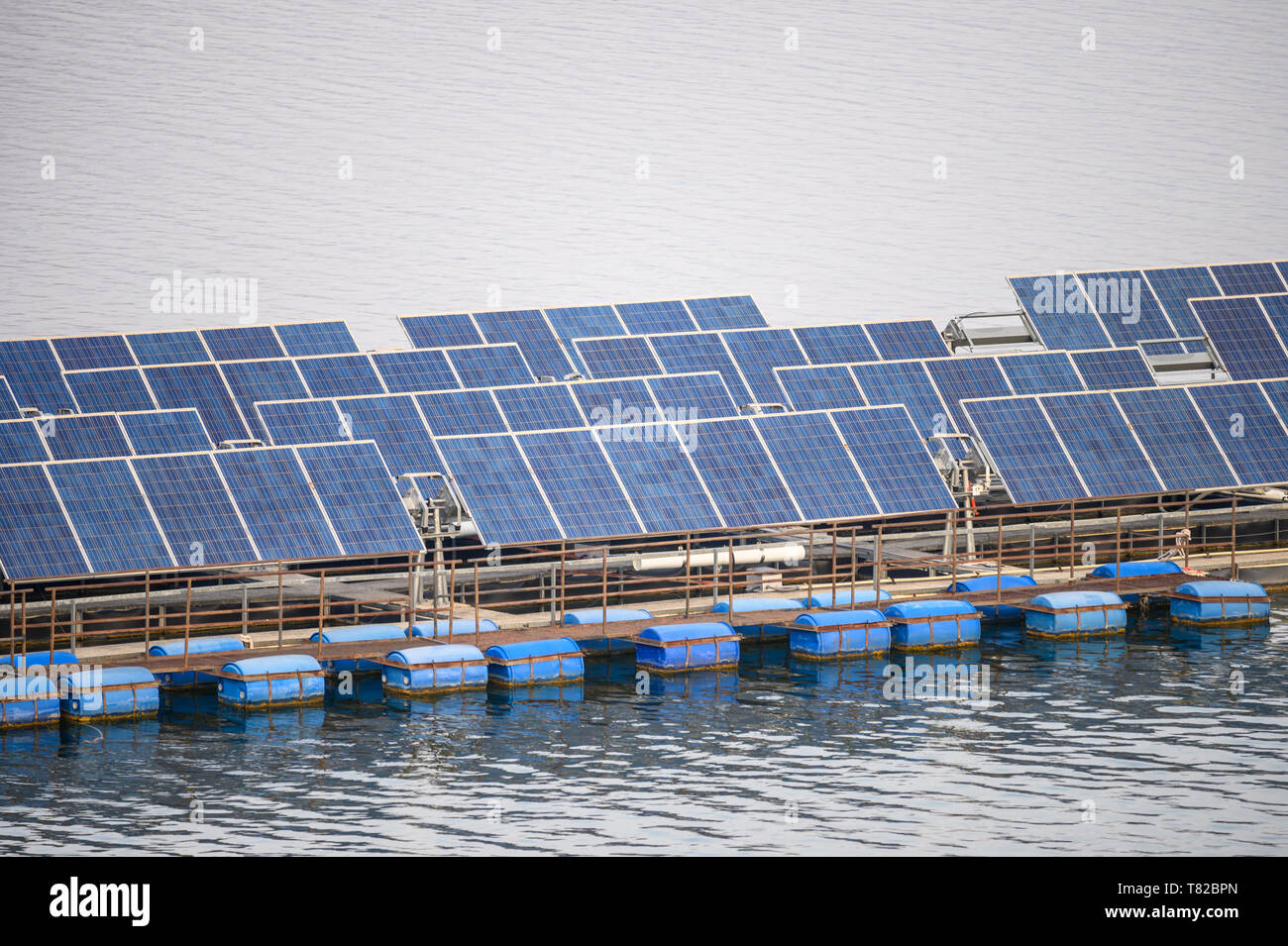 Solar cell system panel a renewable power floating on dam Stock Photo ...