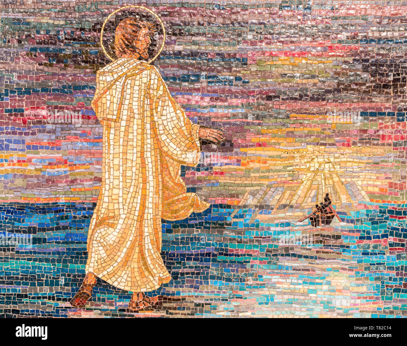 Religious mosaic of Jesus Christ walking on the river waters. From a ...