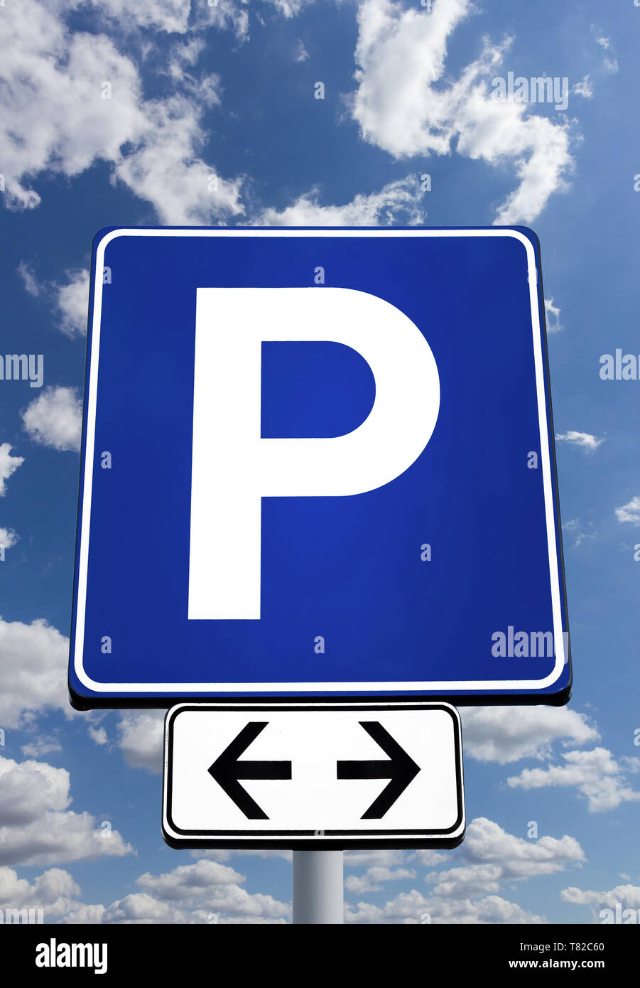 Parking signal with clouds and sky on background Stock Photo - Alamy