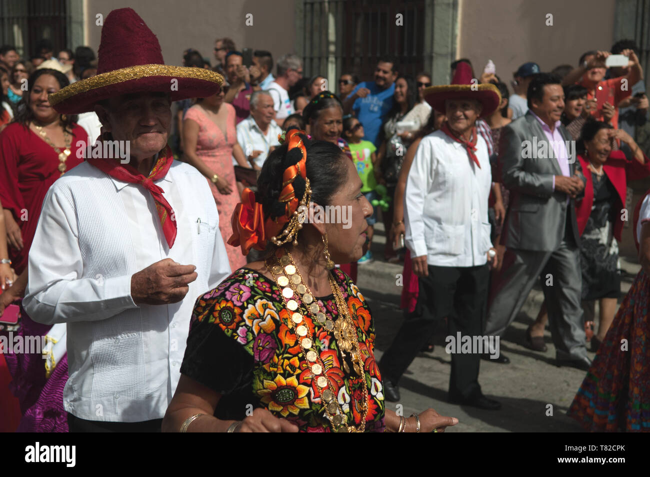 Wedding procession walking through Oaxaca Stock Photo - Alamy