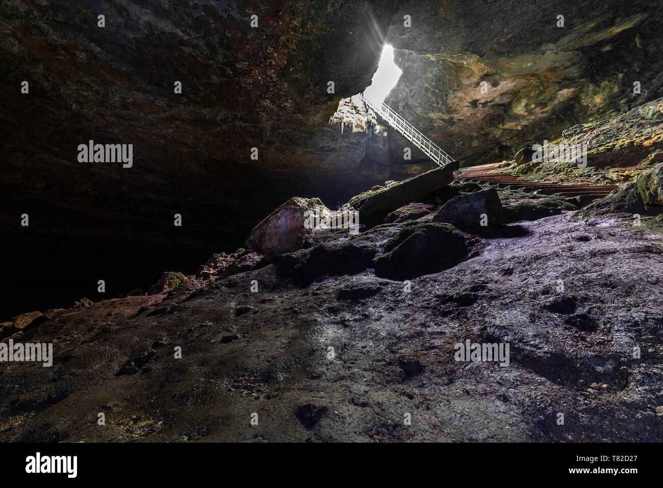 Underground cave "the stairs" in Bulgaria with sun rays from hole in ...