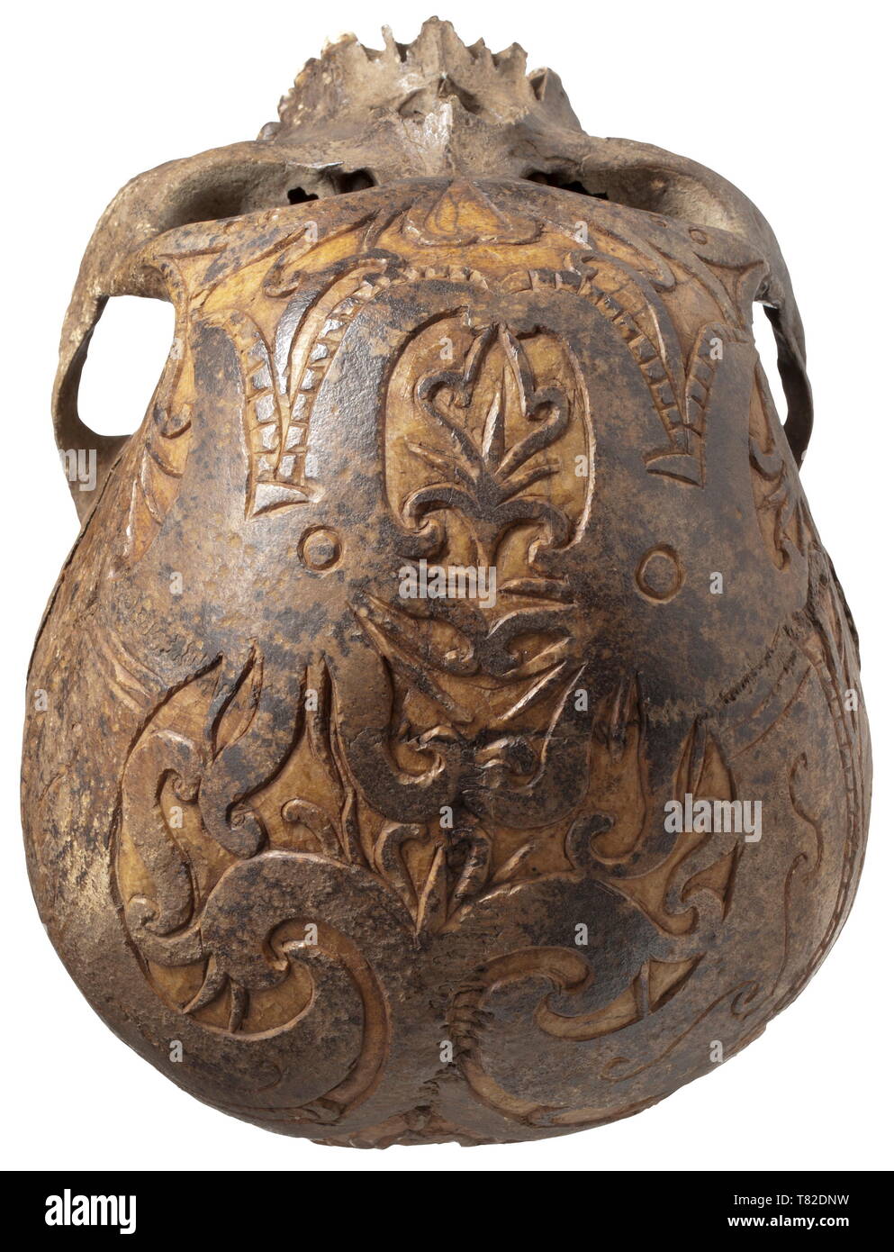A trophy skull of the Dayak people, Borneo Elaborately carved skull ...