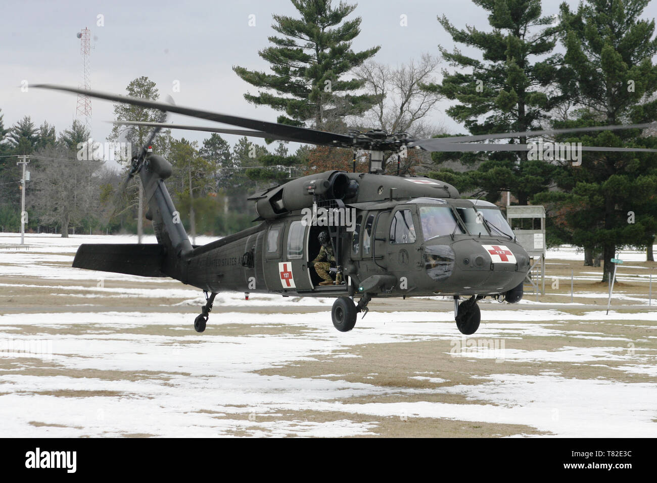 A Blackhawk helicopter prepares to land near the Medical Simulation ...