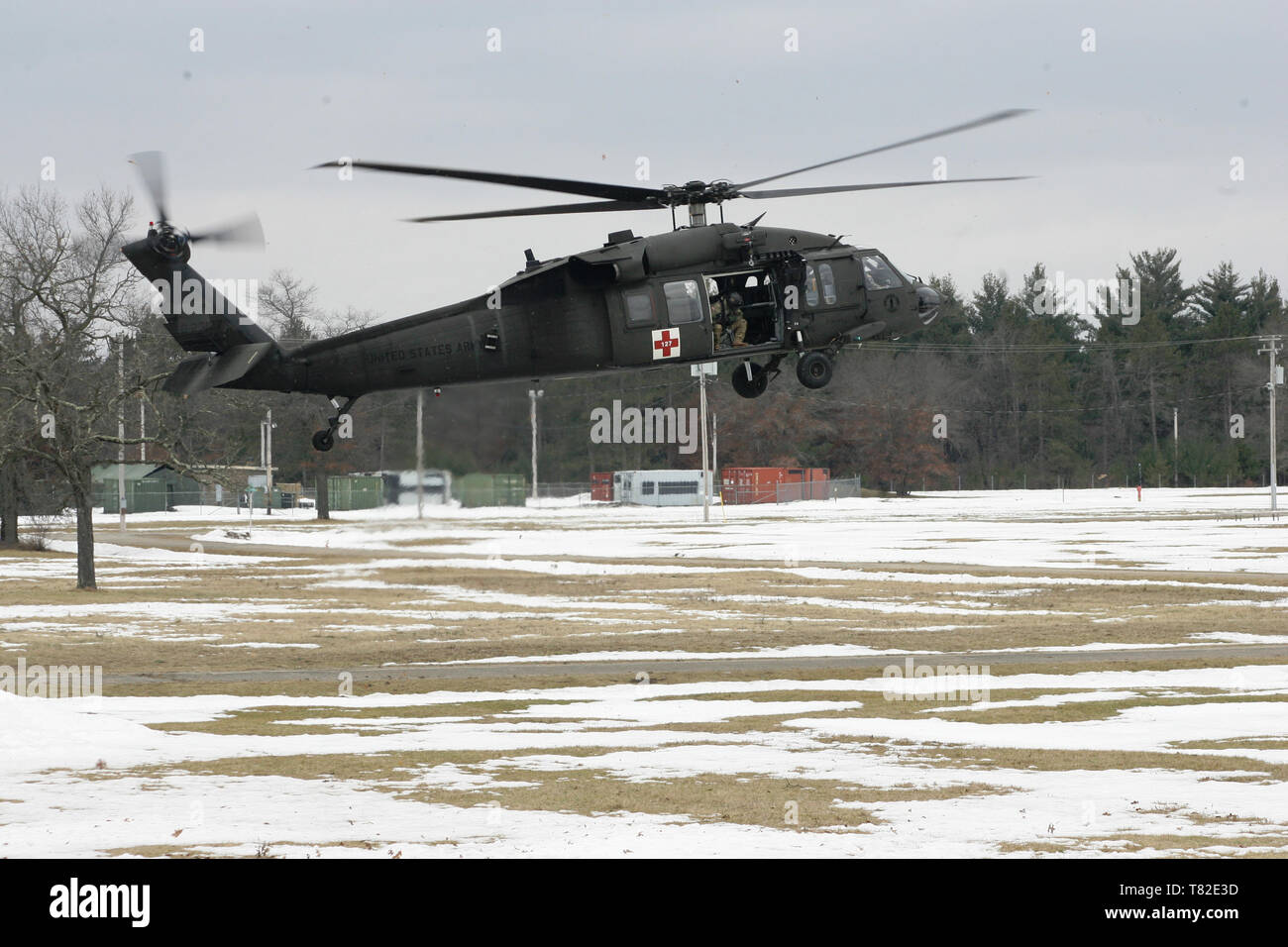 A Blackhawk helicopter prepares to land near the Medical Simulation ...