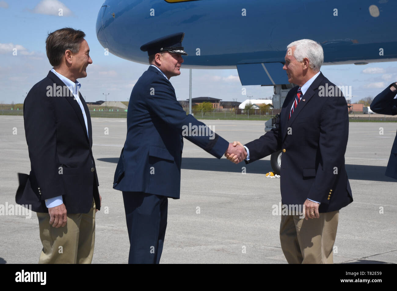 U. S. Vice President Mike Pence shakes hands as he is greeted by Brig ...