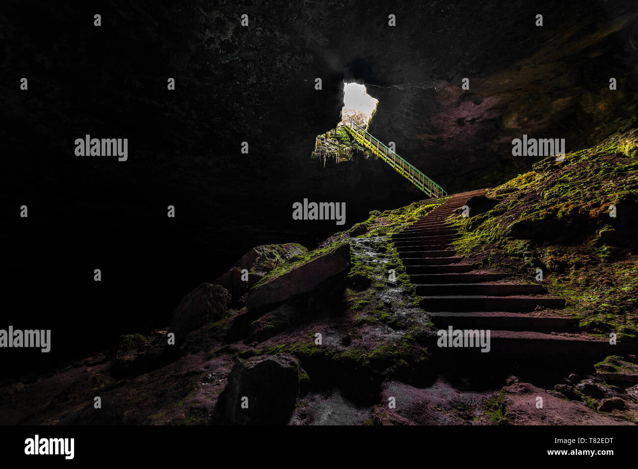 Underground cave "the stairs" in Bulgaria with sun rays from hole in ...