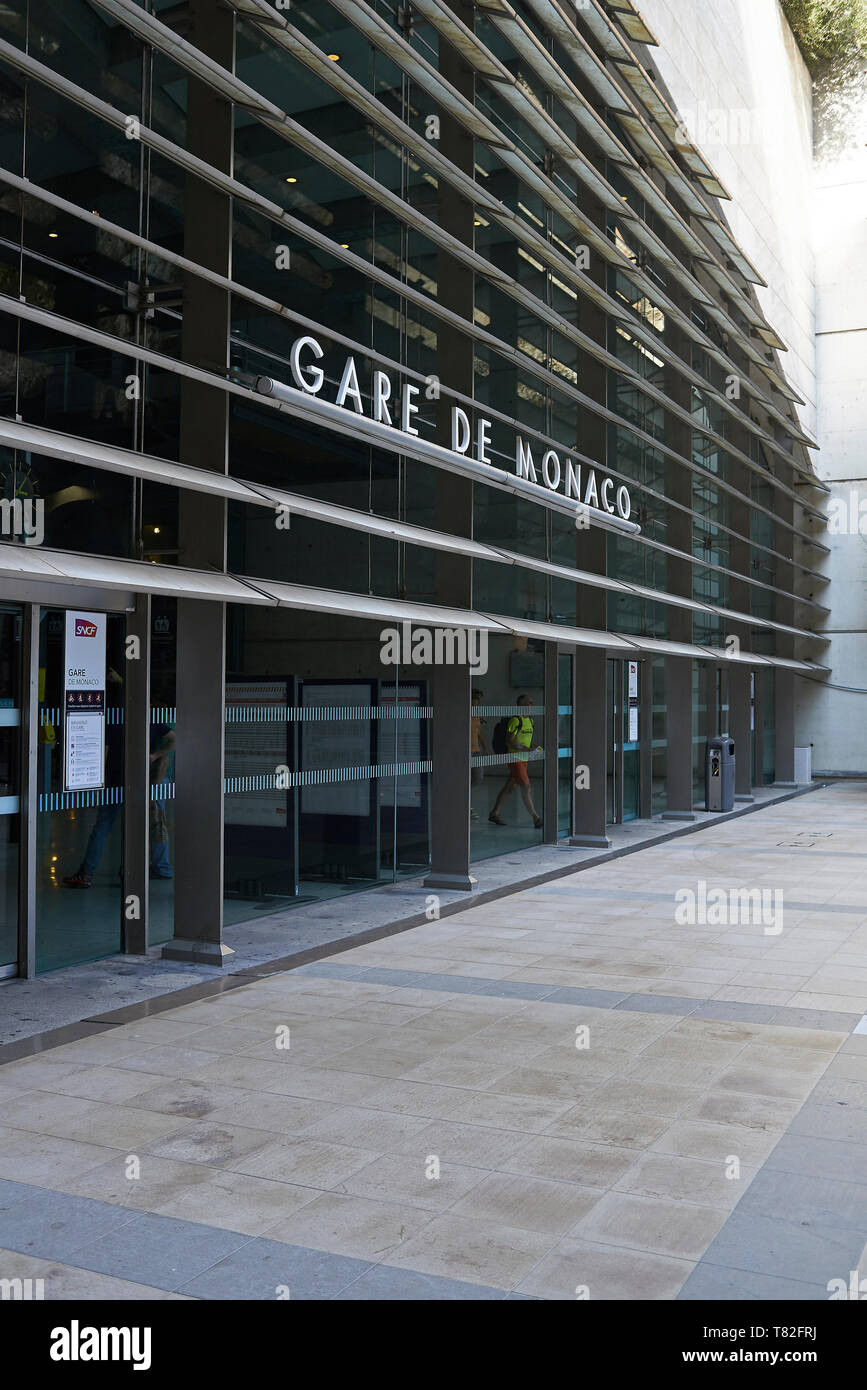 Shots of the train station entrance and tracks at Gare de Monaco in ...