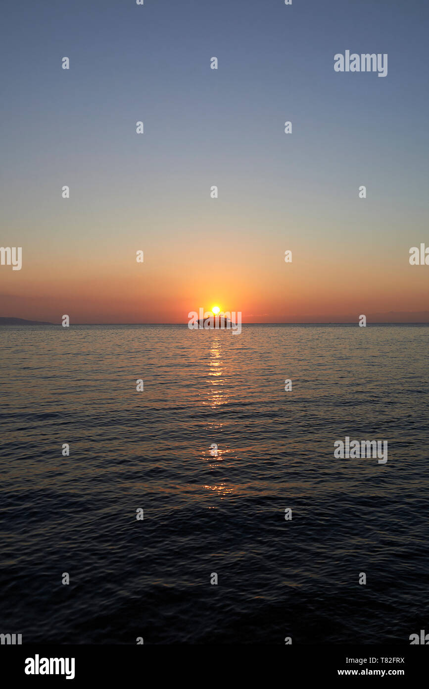 Amazing image of an ankered yacht in the middle of the sun during ...