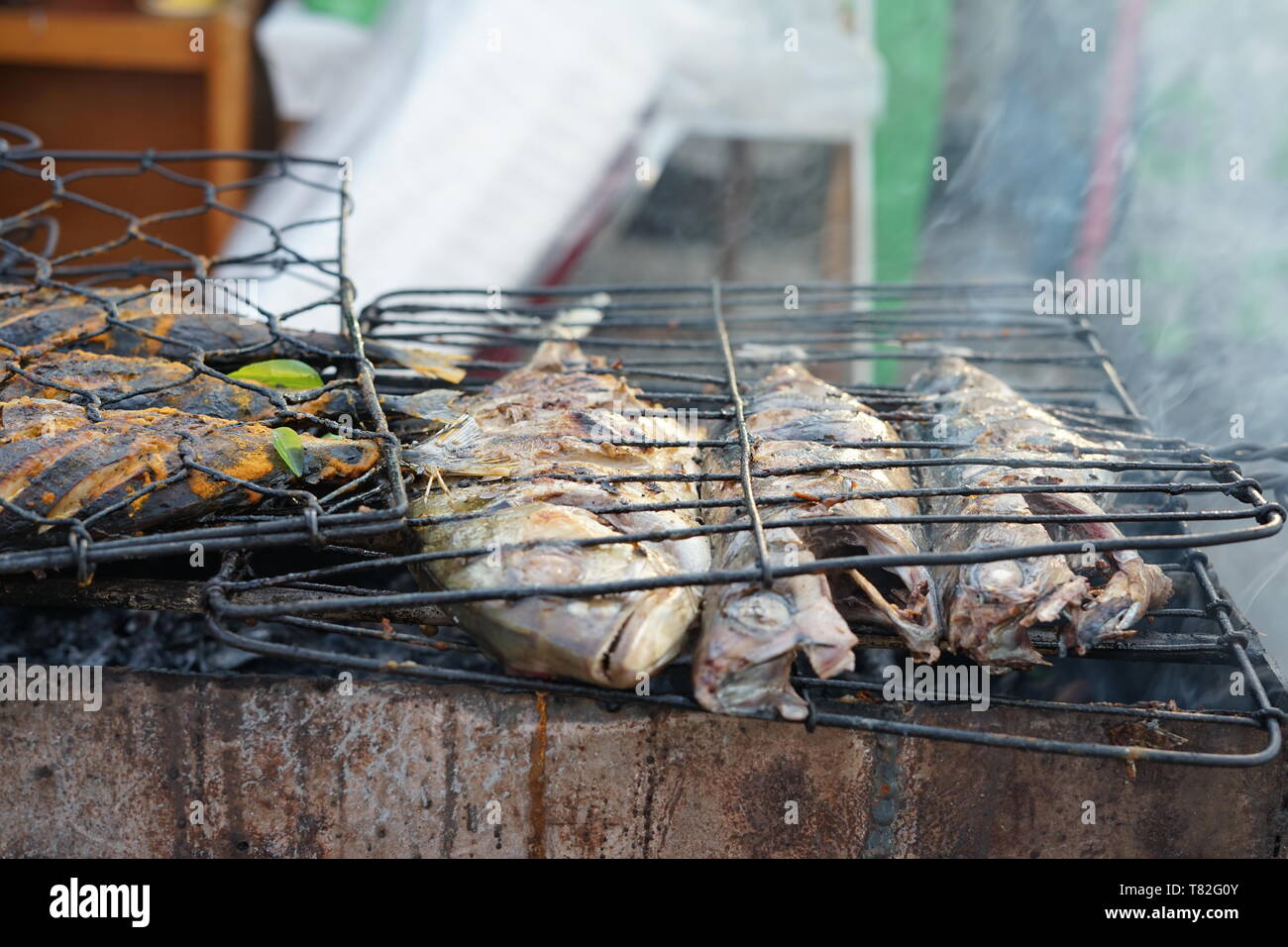 Fish on Grilled at ramadan street food in Indonesia Stock Photo - Alamy