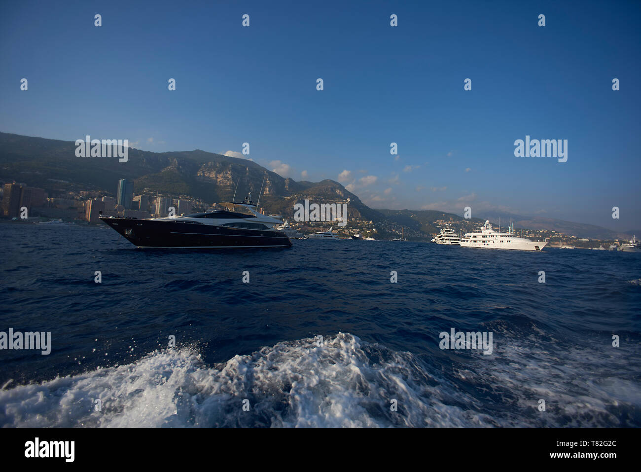 Luxury yachts ankered off the port of Monte Carlo in Monaco in early ...