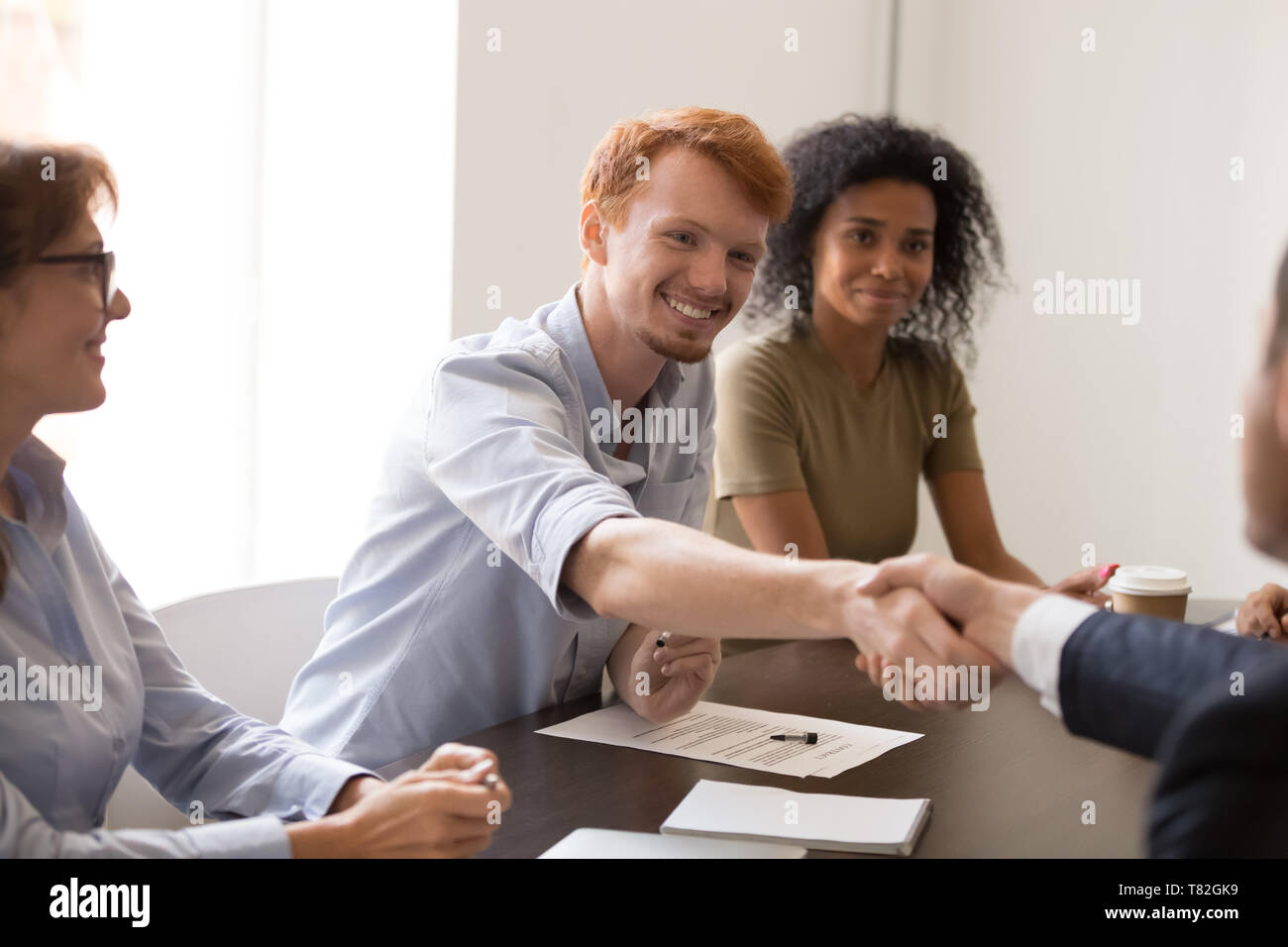 Business partners handshake get acquainted at meeting Stock Photo - Alamy