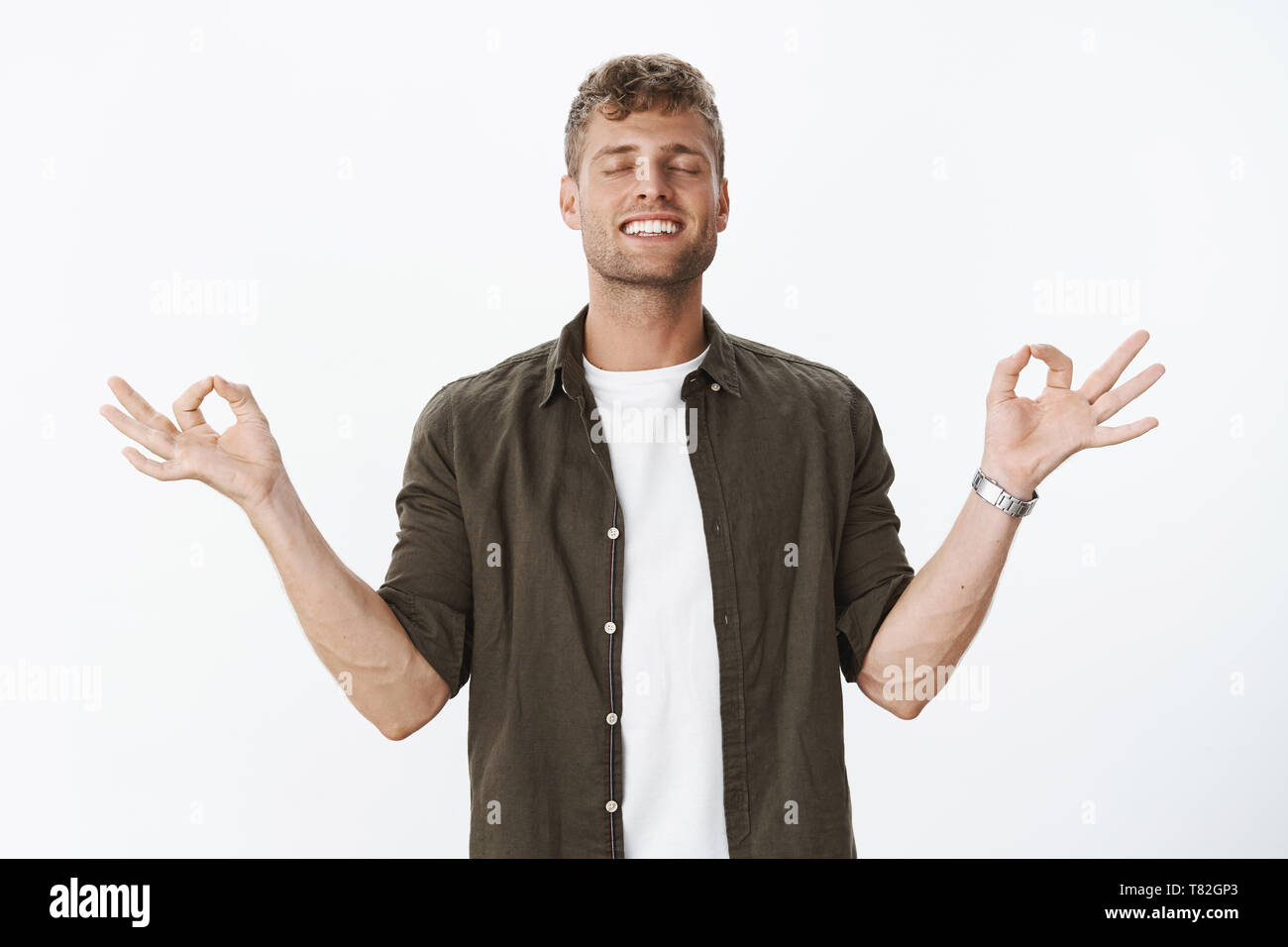 Guy reaching nirvana feeling happy and relaxed released from stress ...