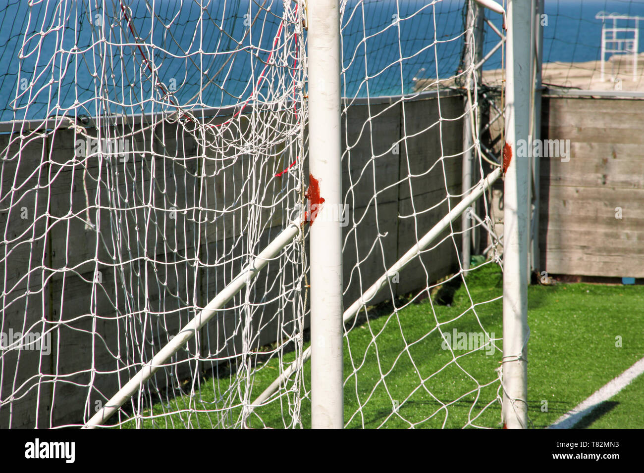 Part of soccer goal door with white net. Close up for football goal at ...