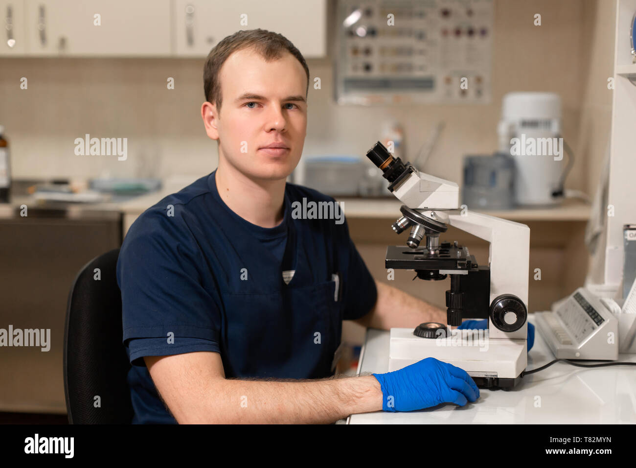 Portrait of young caucasian male scientist, medical worker, tech or ...