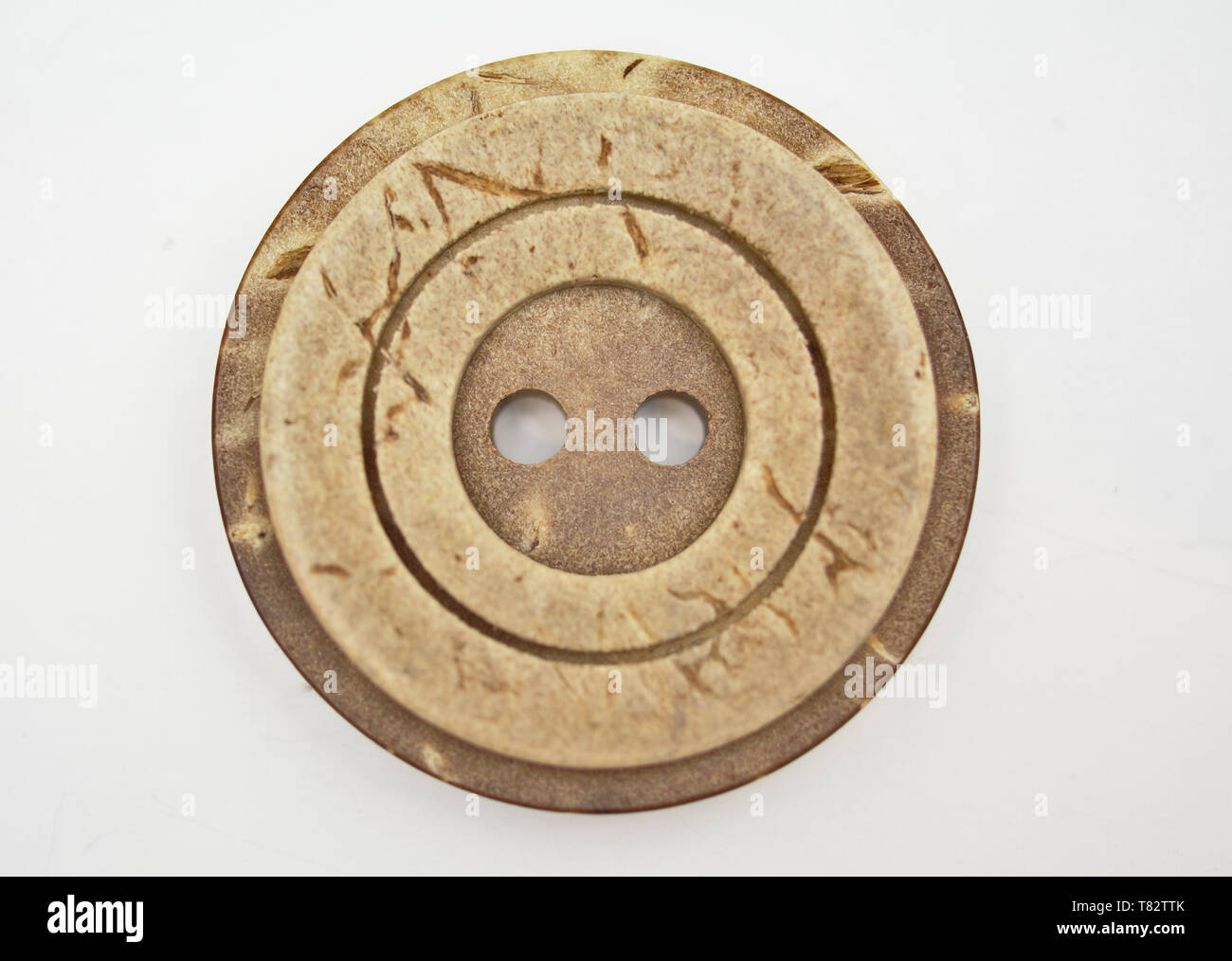 One brown round button isolated on white background Stock Photo - Alamy