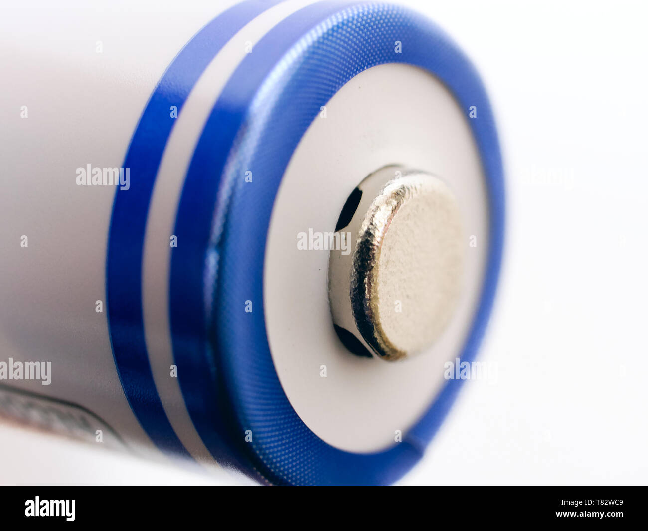 White battery with blue stripes close up macro detail Stock Photo - Alamy