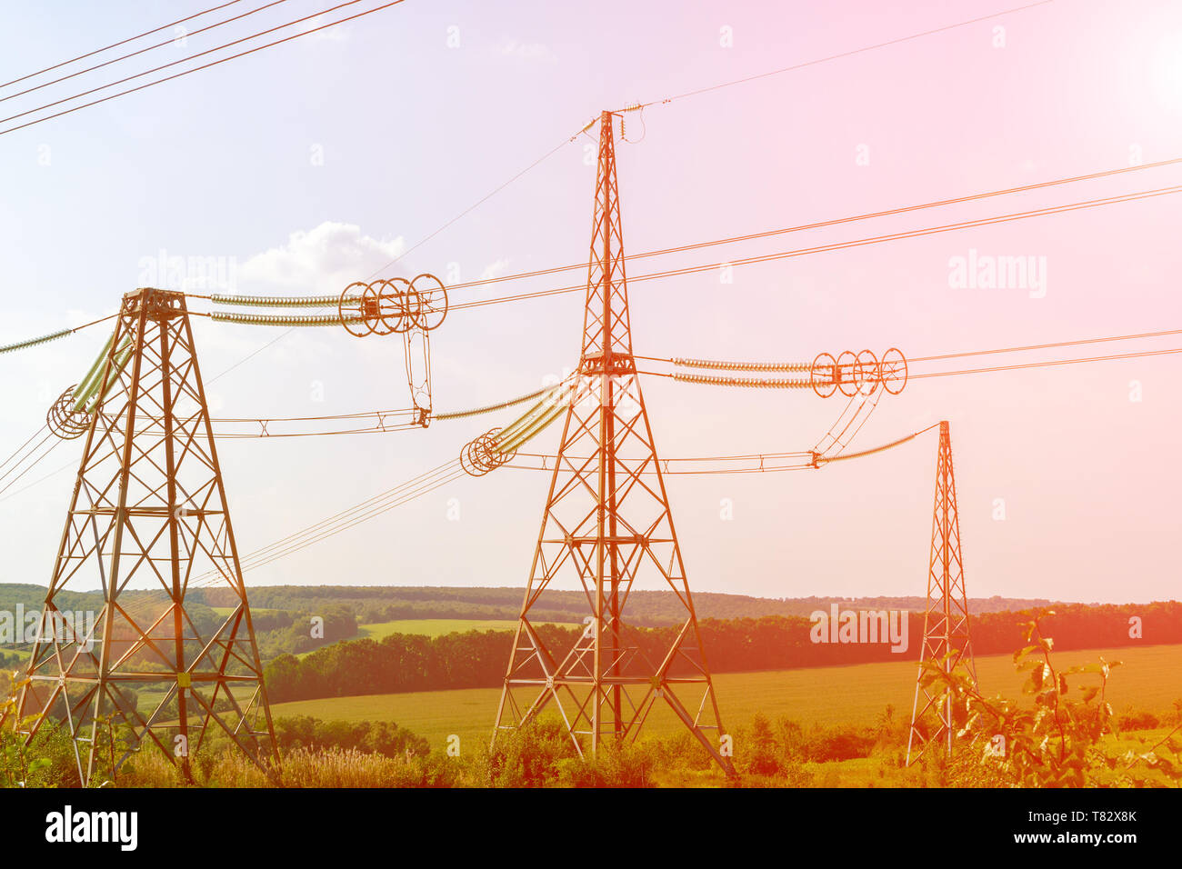 metal power line poles with a wires. Electricity transmission concept ...