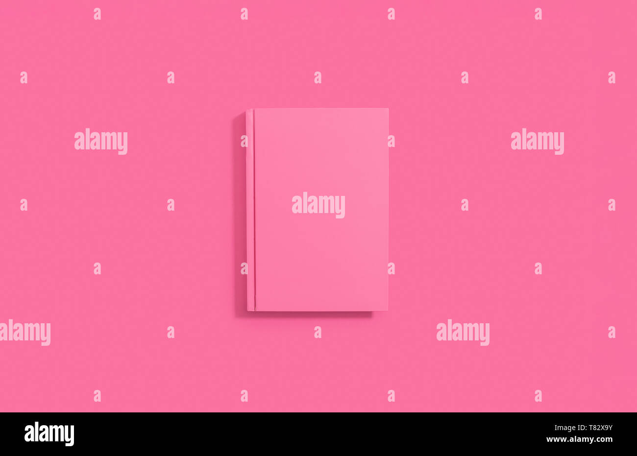 Pink notebook, diary, journal on a matching pink background with copy ...