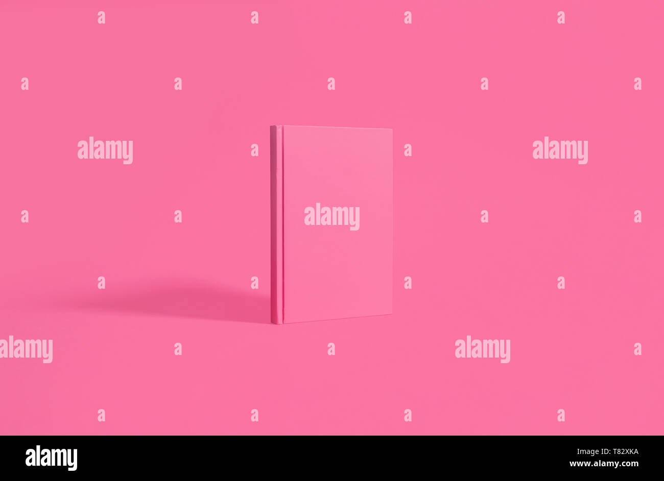 Pink notebook, diary, journal on a matching pink background with copy ...