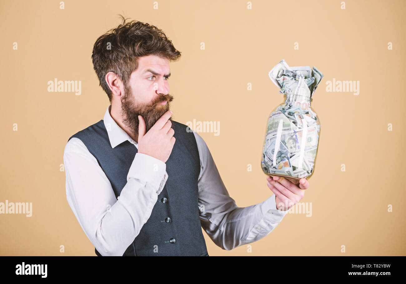 Financial success. Businessman with his dollar savings. Richness and ...