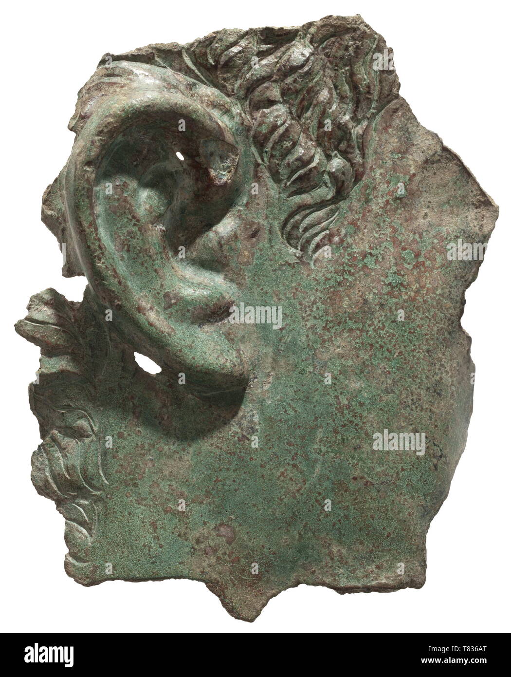 A Roman head fragment of a bronze statue 1st/2nd century AD. Bronze ...