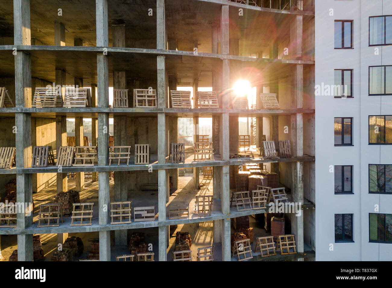 Modern building under construction detail, concrete frame, window ...