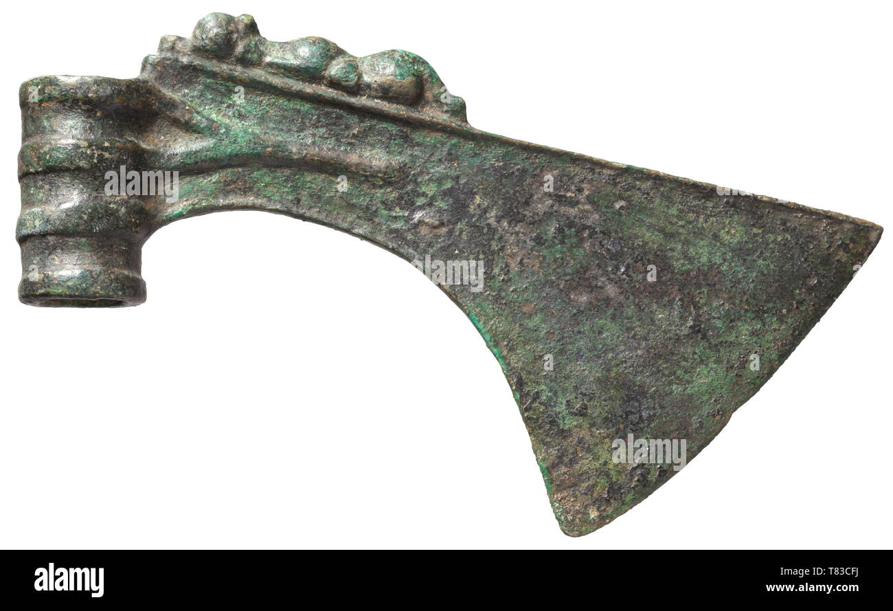 A Luristan bronze axe Circa 1500 BC. Bronze with black-green patina ...