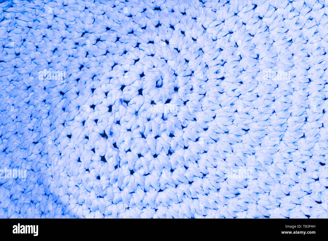 Knitted wool texture with a cool blue filter Stock Photo - Alamy
