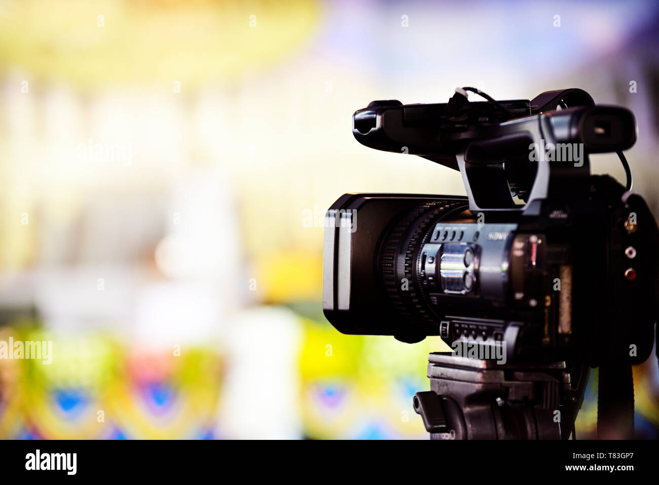 Video journalist capturing moving picture by camcorder in a event Stock ...