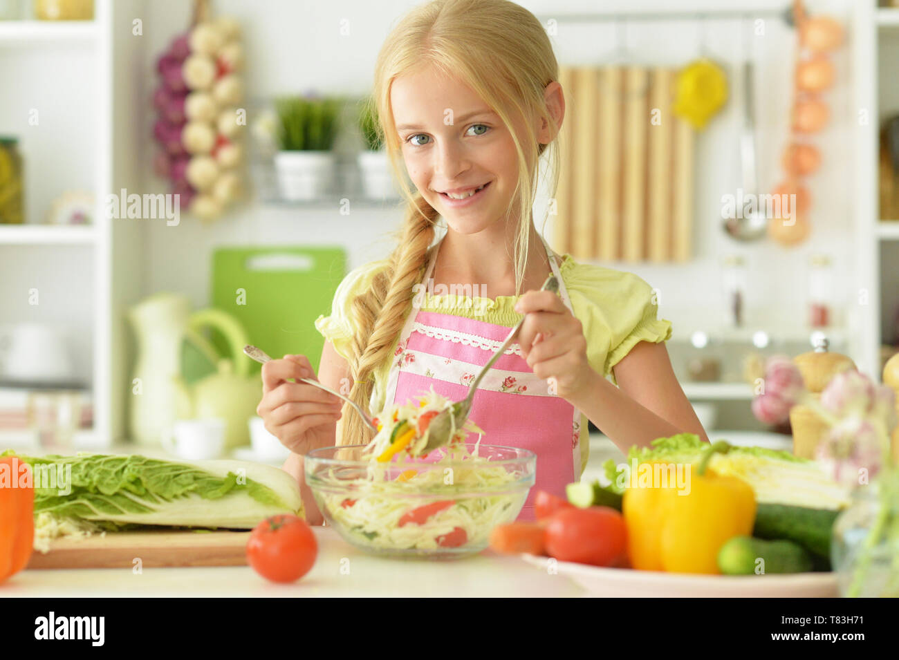 Portrait of the girl in the kitchen Stock Photo - Alamy