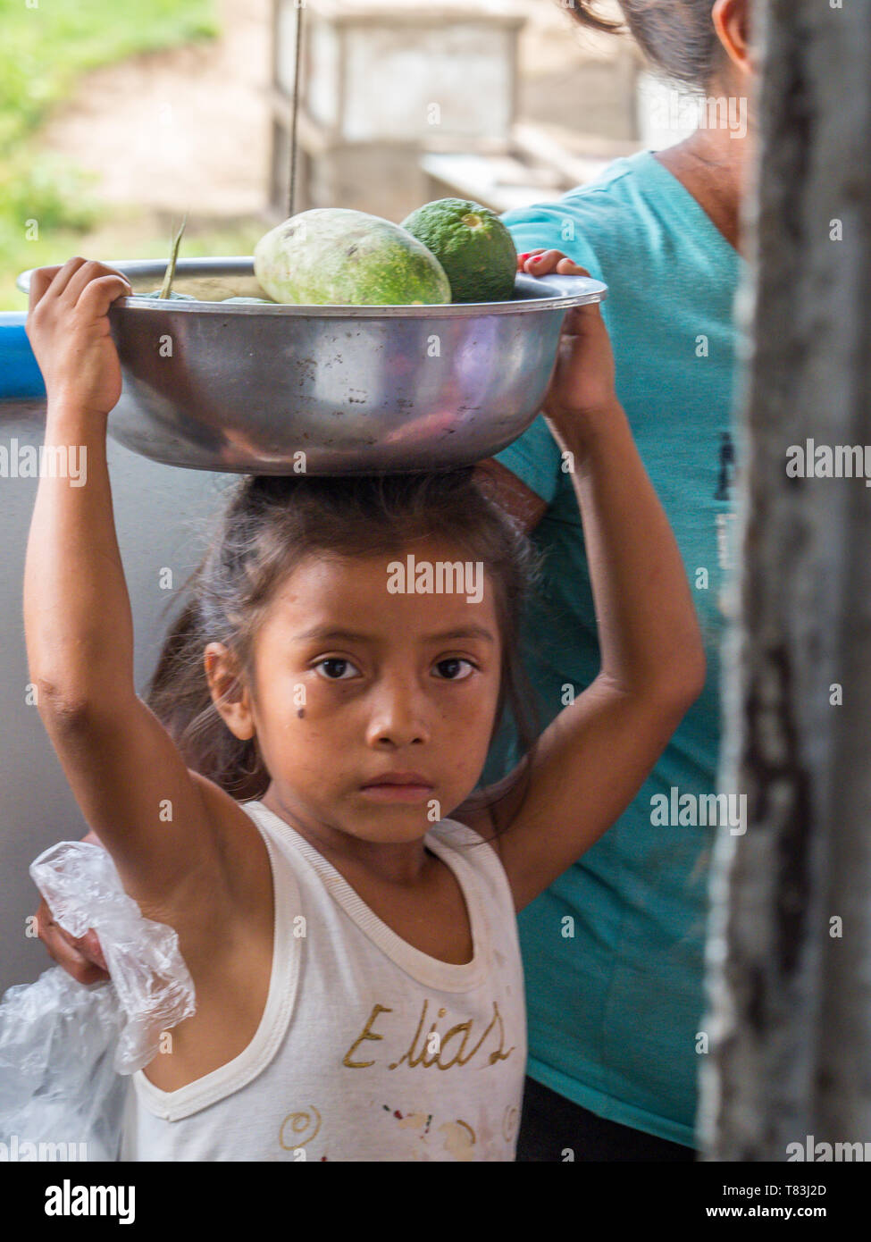 Small village by Amazon River, Peru - Dec 03, 2018: Child labor. Small ...