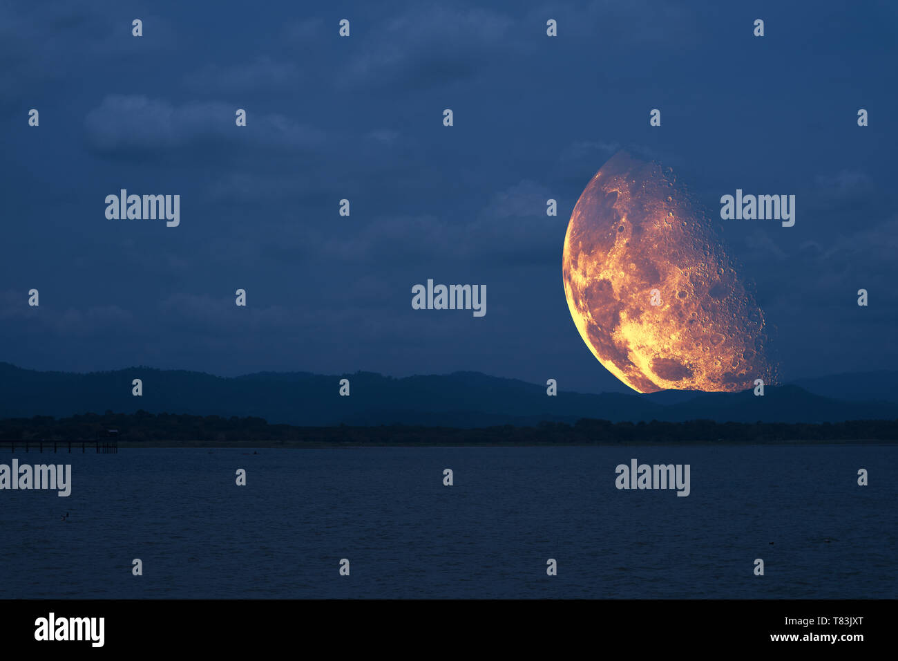 half moon floating in sky back on silhouette mountain ,Elements of this ...