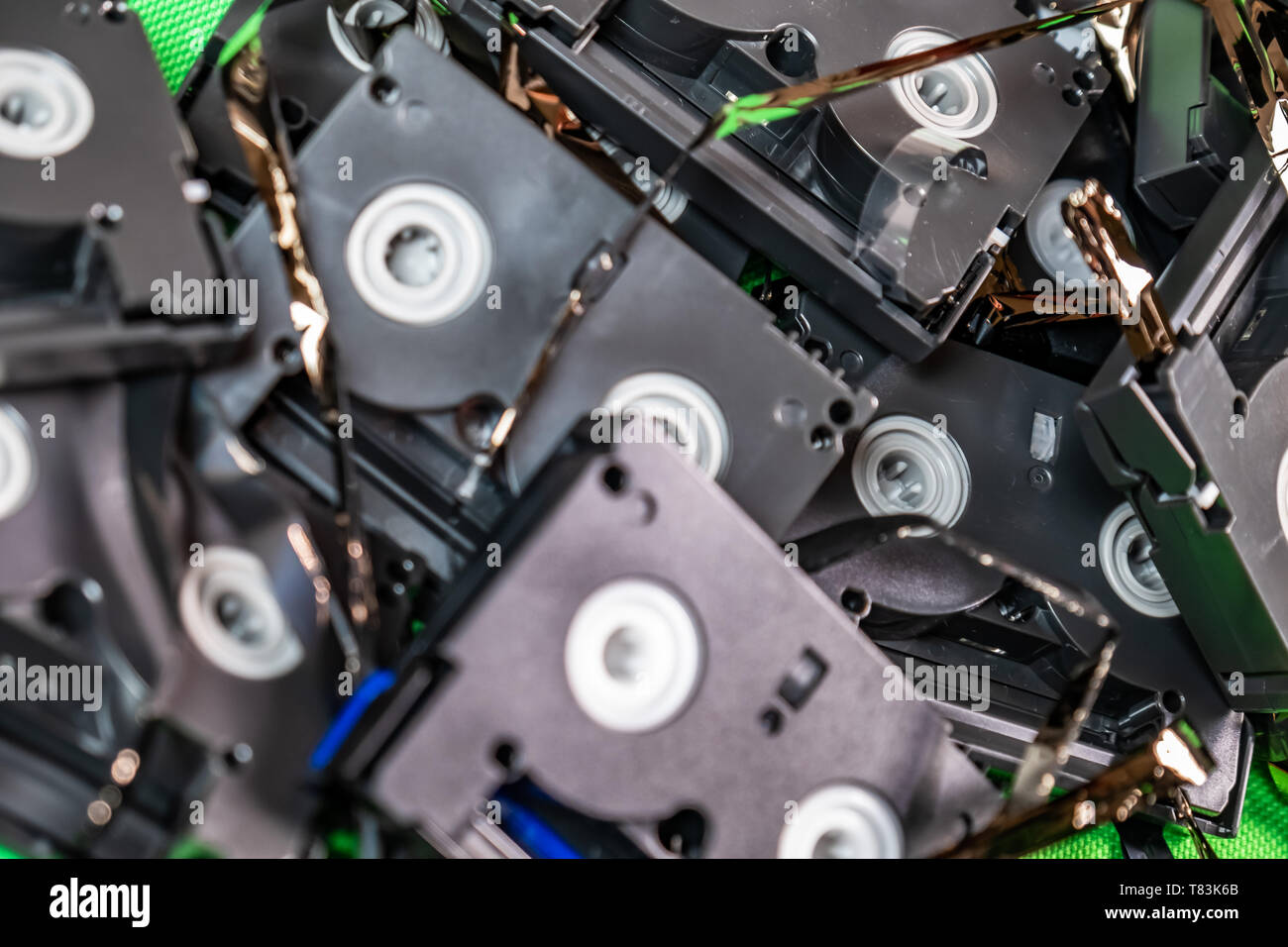 Tape pulled out from mini dv format video cassette tape Stock Photo - Alamy