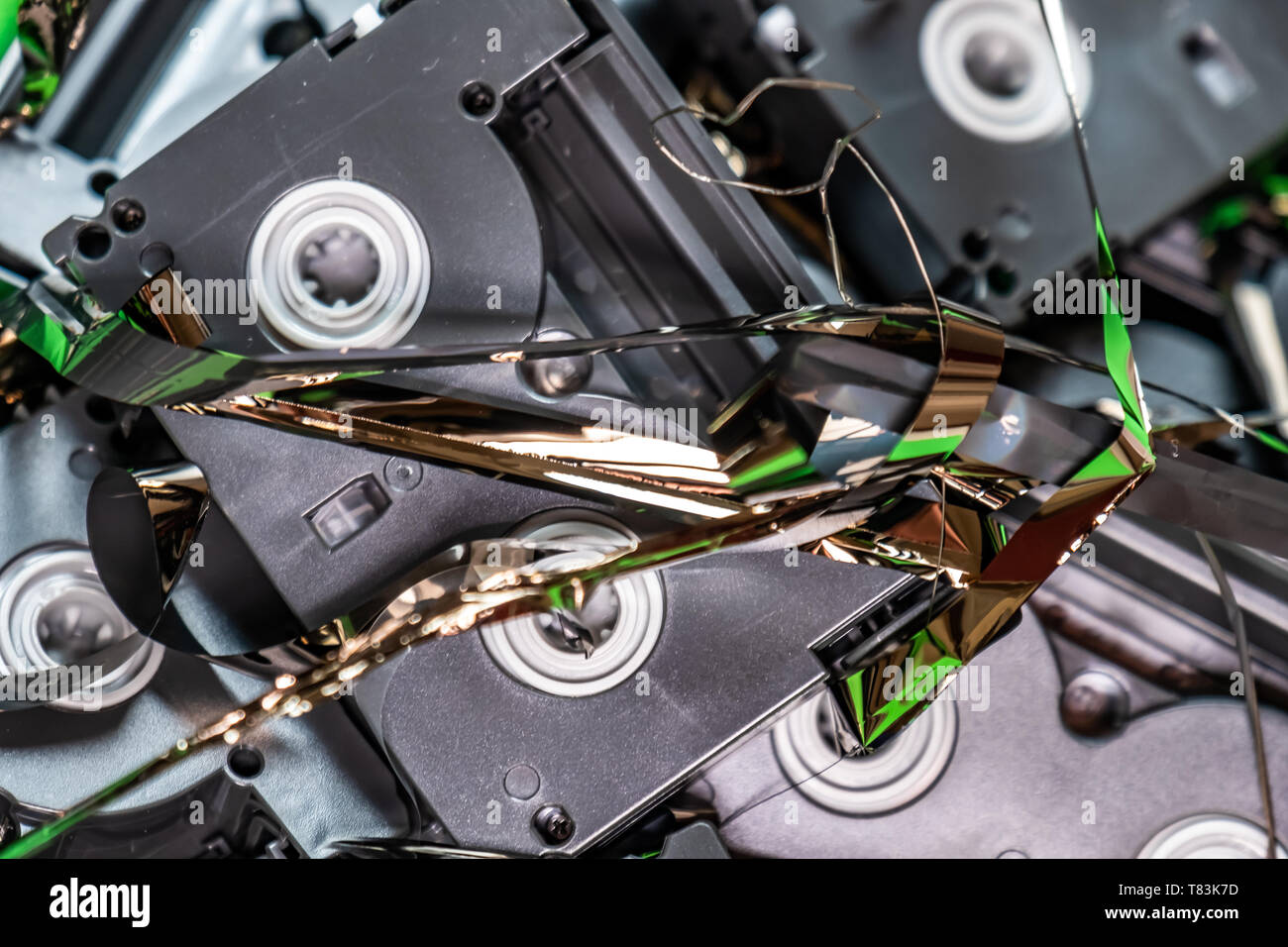 Tape pulled out from mini dv format video cassette tape Stock Photo - Alamy