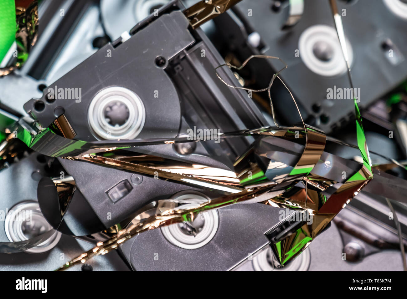 Tape pulled out from mini dv format video cassette tape Stock Photo - Alamy