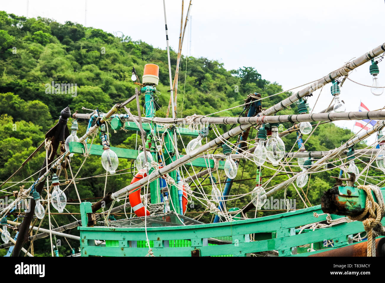 Spotlights was hanging on a fishing boat and squid fishing to catch the ...
