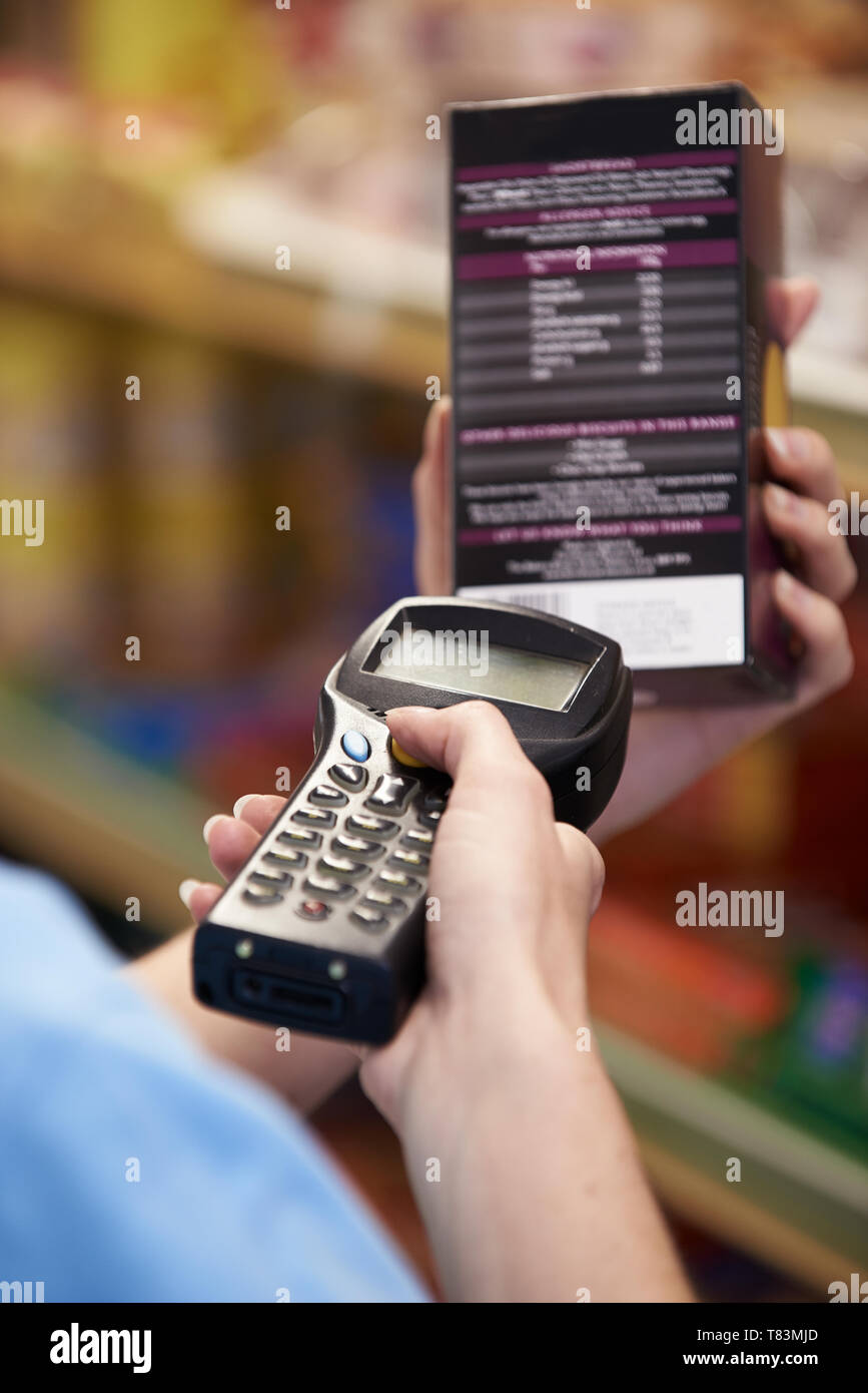Checking Stock Control In Supermarket High Resolution Stock Photography ...
