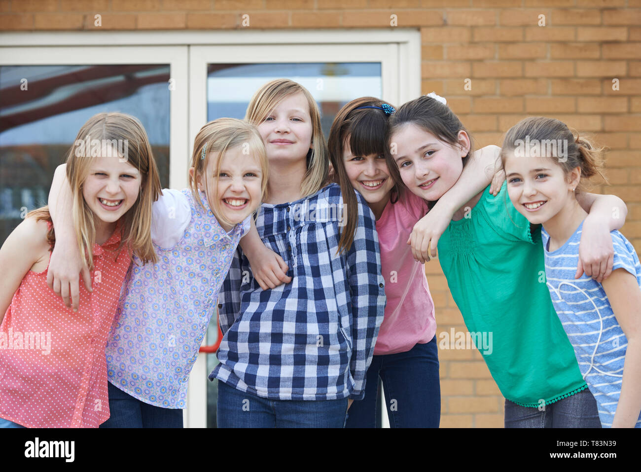 Portrait Of Female Elementary School Pupils Outside Classroom Stock ...