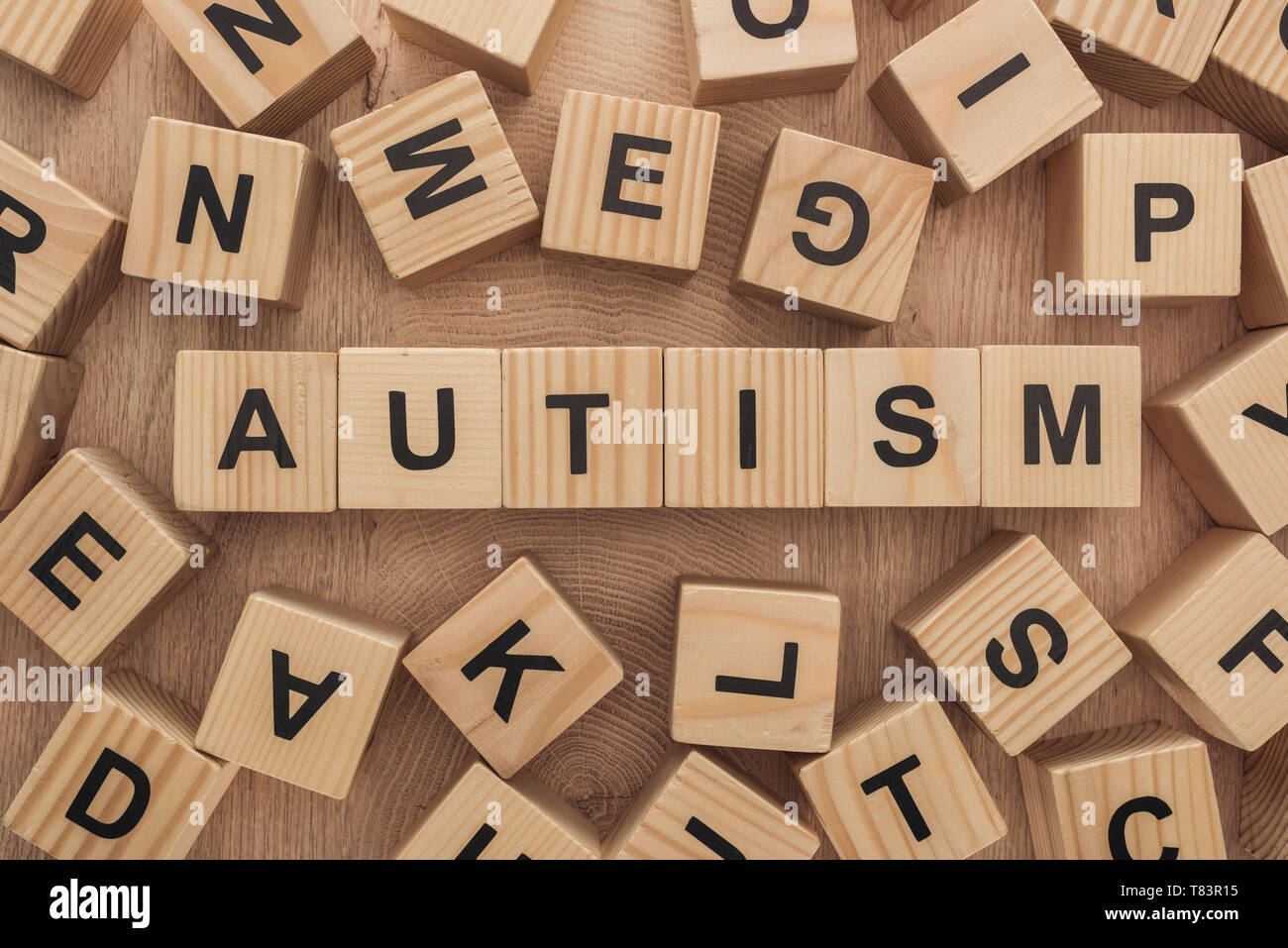 top view of autism lettering among wooden blocks with letters Stock ...