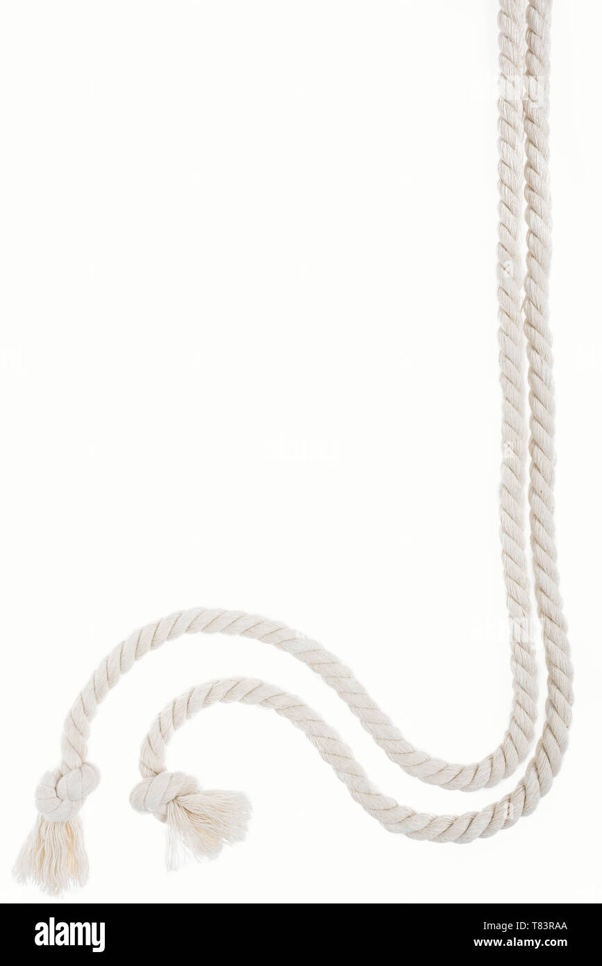 white long curled ropes with knots isolated on white Stock Photo - Alamy