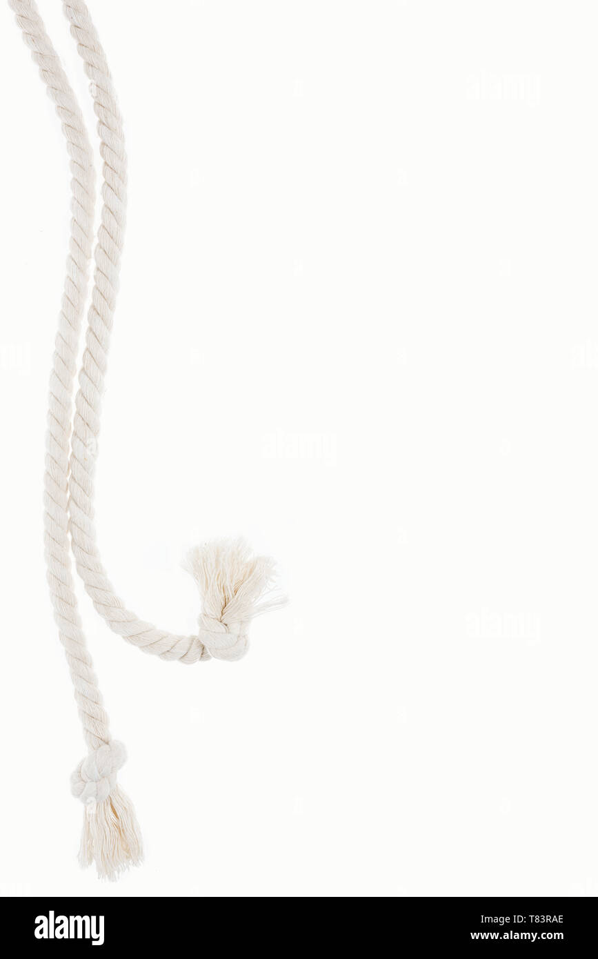 white long ropes with knots isolated on white Stock Photo - Alamy