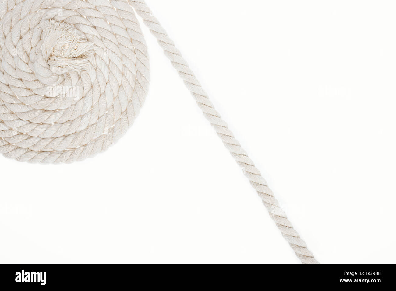 white, curled and long rope isolated on white Stock Photo - Alamy
