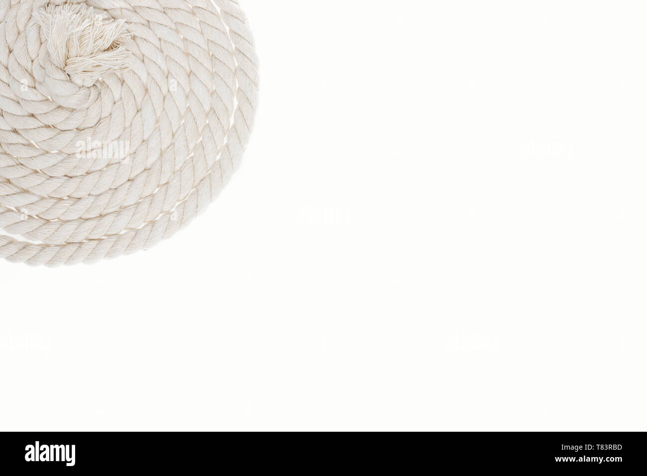 white, long and curled rope isolated on white Stock Photo - Alamy