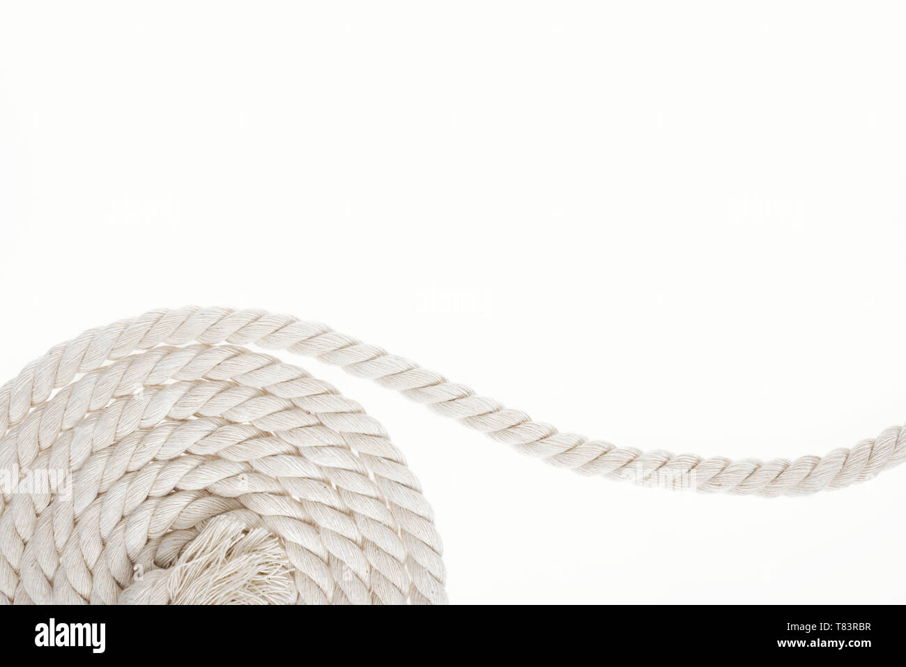 white, long and twisted rope isolated on white Stock Photo - Alamy